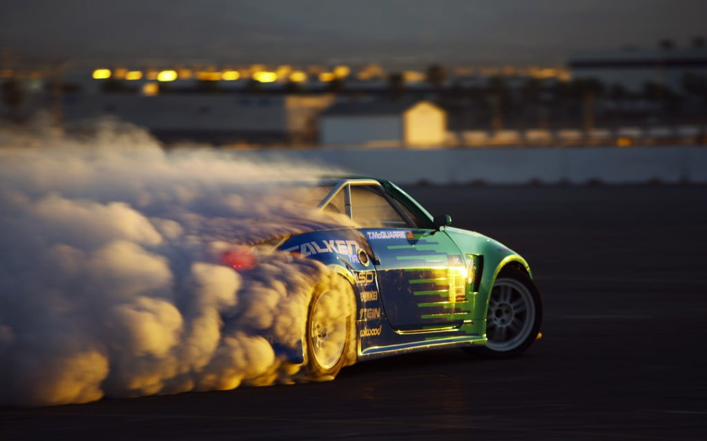 car-drift-sunset-burnout | Octanos.co